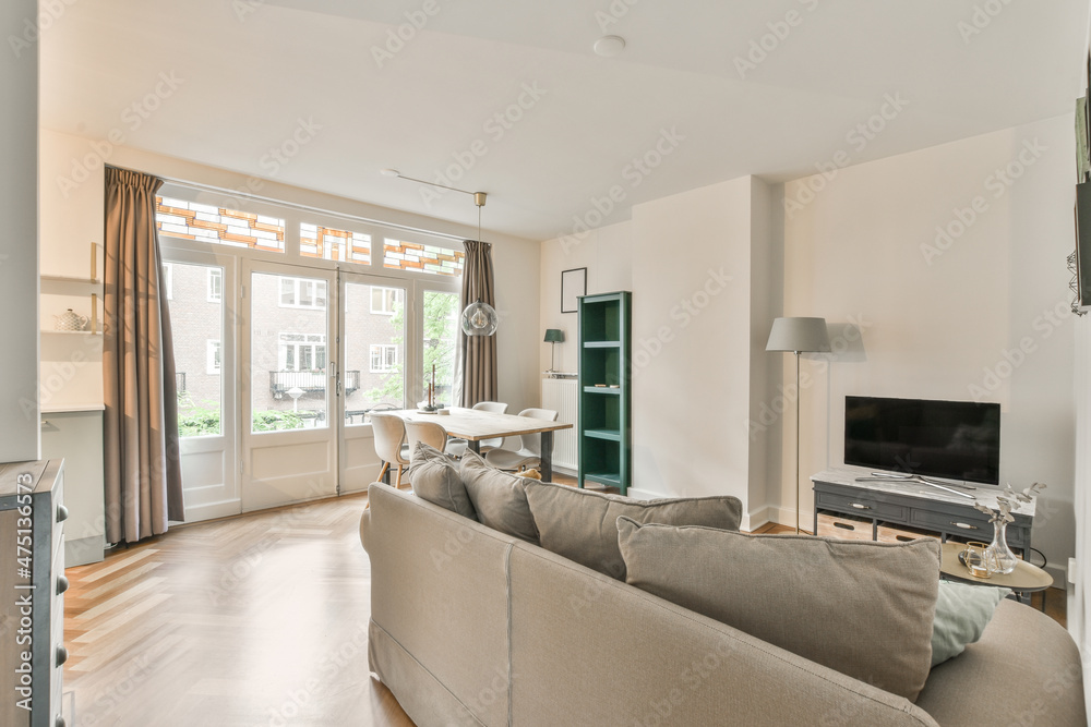 Living room with sofa with TV set Stock Photo | Adobe Stock