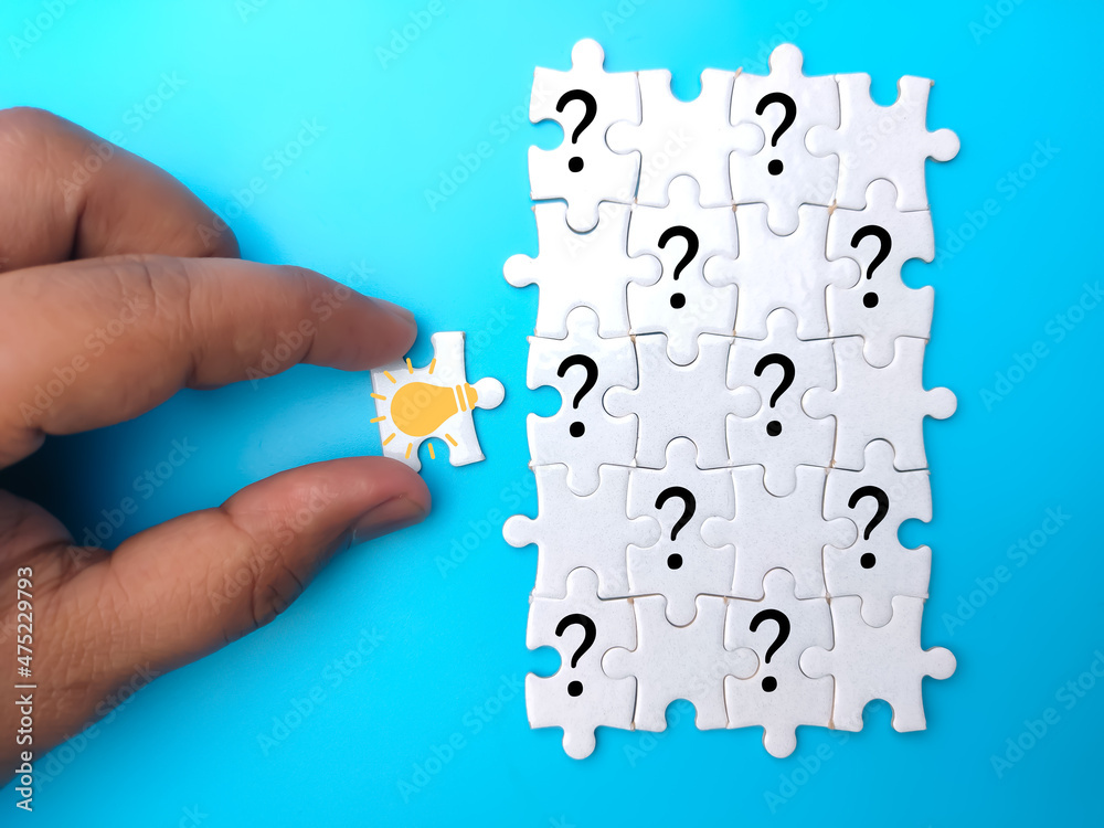 Puzzles with question mark icons and ideas. the concept of questions ...