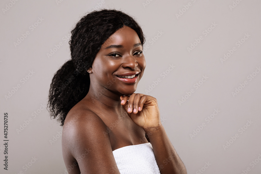 Portrait Of Beautiful Smiling Black Woman With Clean Skin On Grey ...