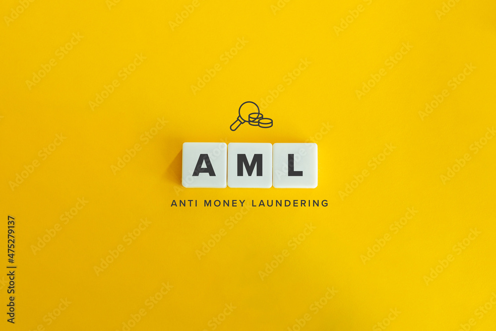 Anti Money Laundering (AML) banner. Block letters on bright orange ...
