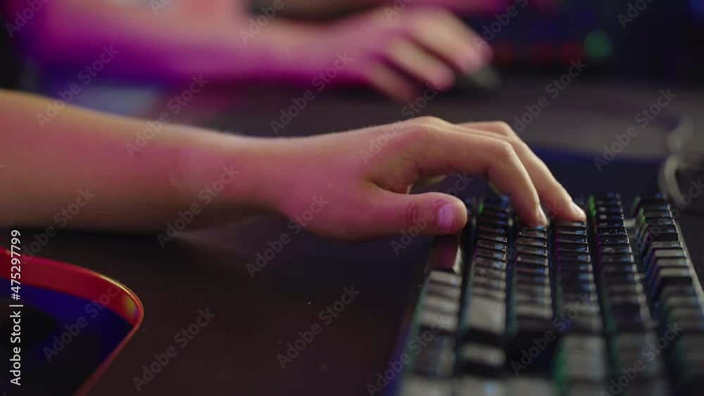 Gamer Controls Online Gaming Action By Pressing Buttons On Keyboard ...