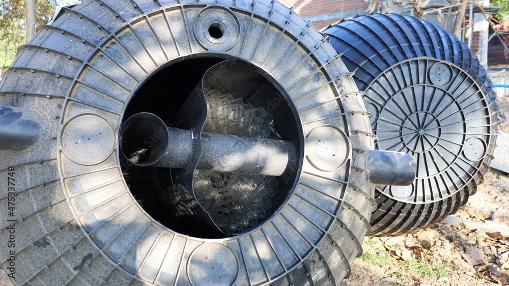 Foto de Black septic tank. Closeup plastic bucket outdoor double septic ...