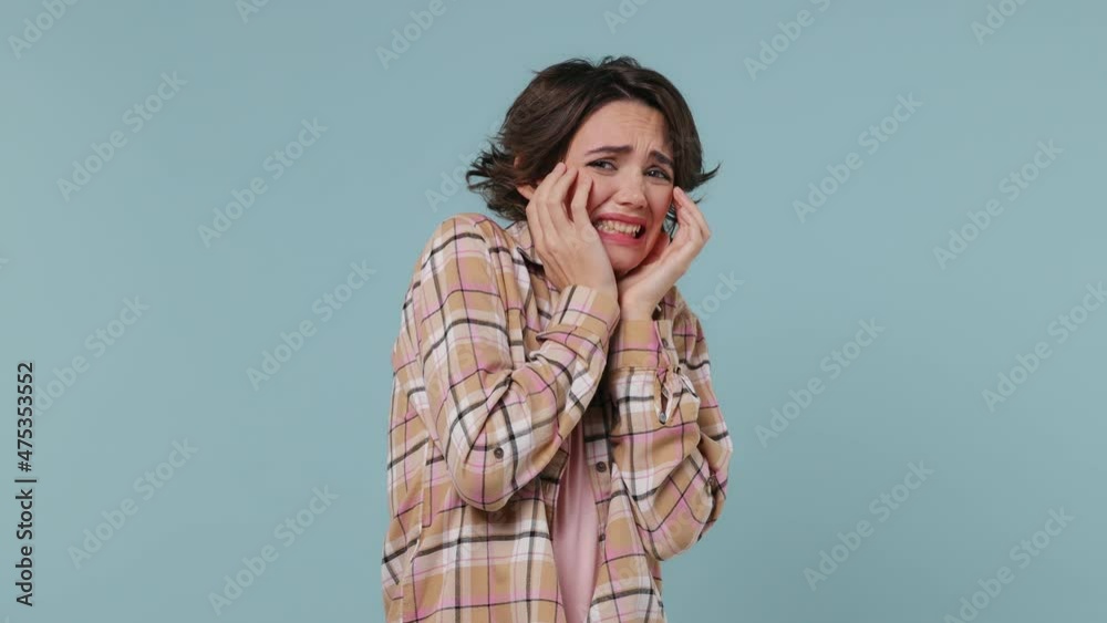 Scared shocked sad young brunette woman 20s years old wears plaid shirt ...