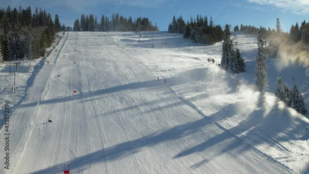 Vidéo Stock Famous ski resort in the winter, aerial view. Ski slope and ...