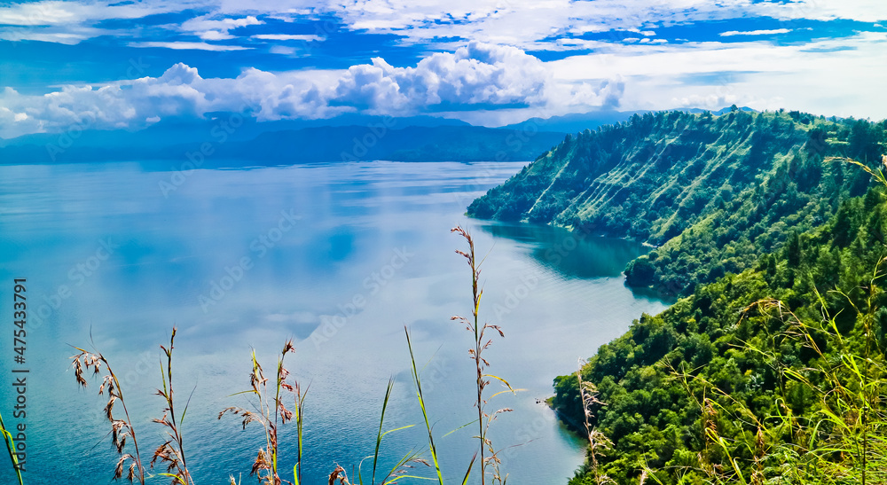 The beauty of Lake Toba which is a caldera lake comes from an ancient ...