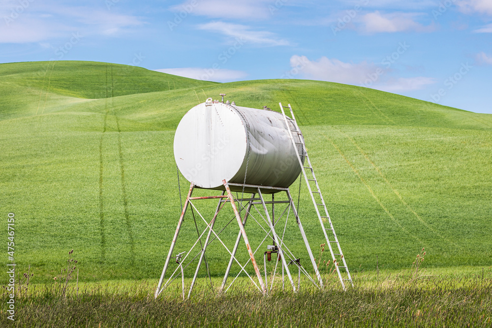 Garfield, Washington State, USA. Water tank and wheat fields in the ...