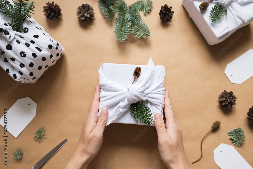 Eco and sustainable gift wrapping ideas. Gift box in natural fabric ...