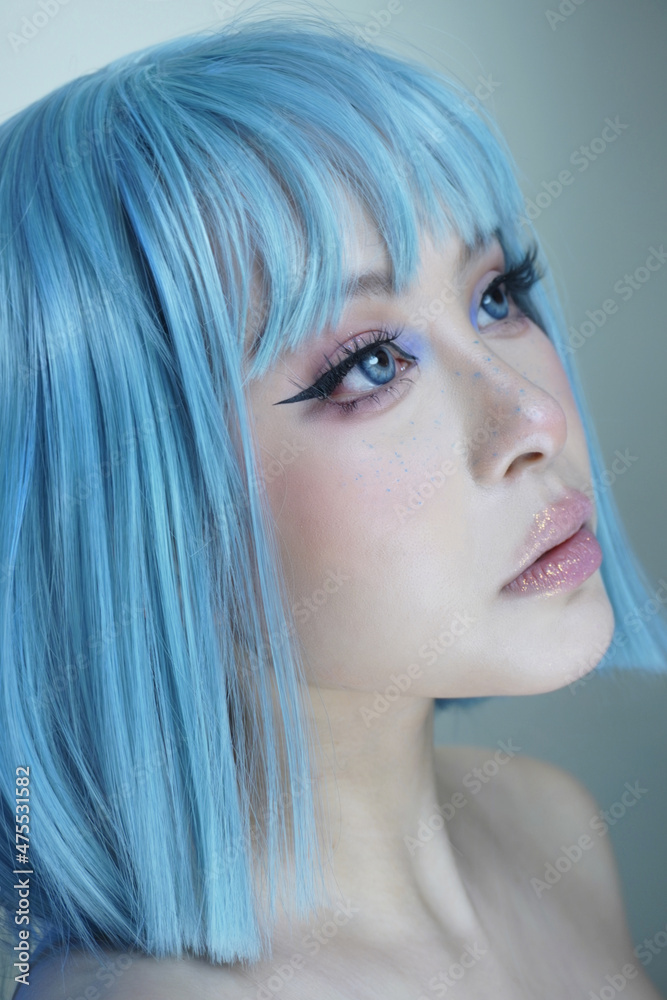Pretty Asian girl with blue hair represents the LGBT community. She has ...