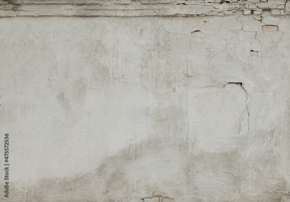 Texture of grey concrete wall with dark water and oil marks running ...