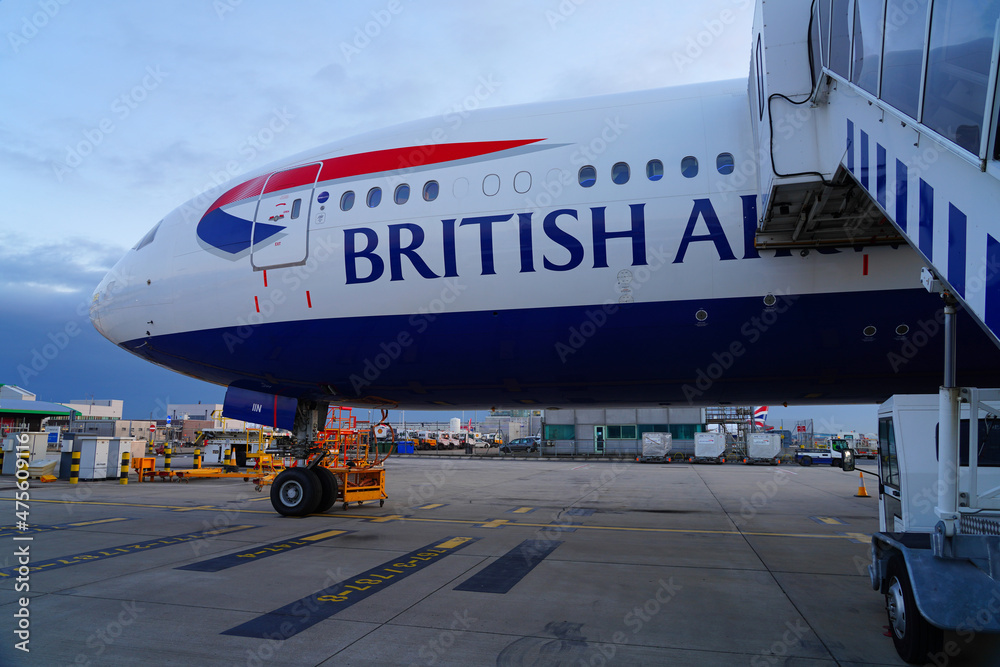 HEATHROW, ENGLAND -15 NOV 2021- Sunset view of an airplane from British ...