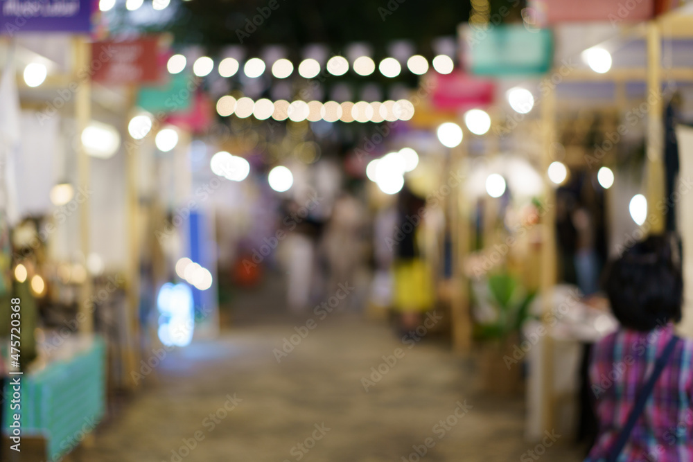 Abstract blurred night market view of empty supermarket aisle ...