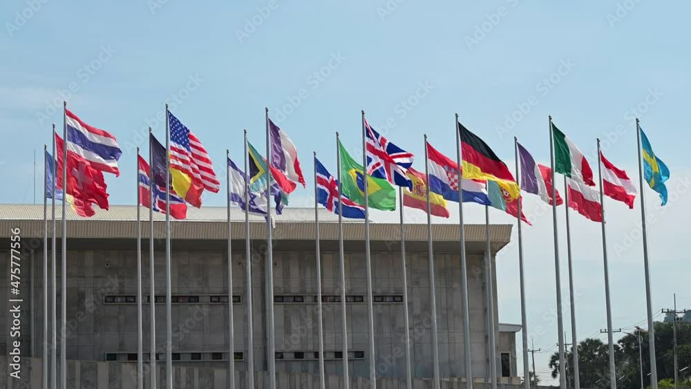 4K-flags of different countries flying in the wind on white background ...