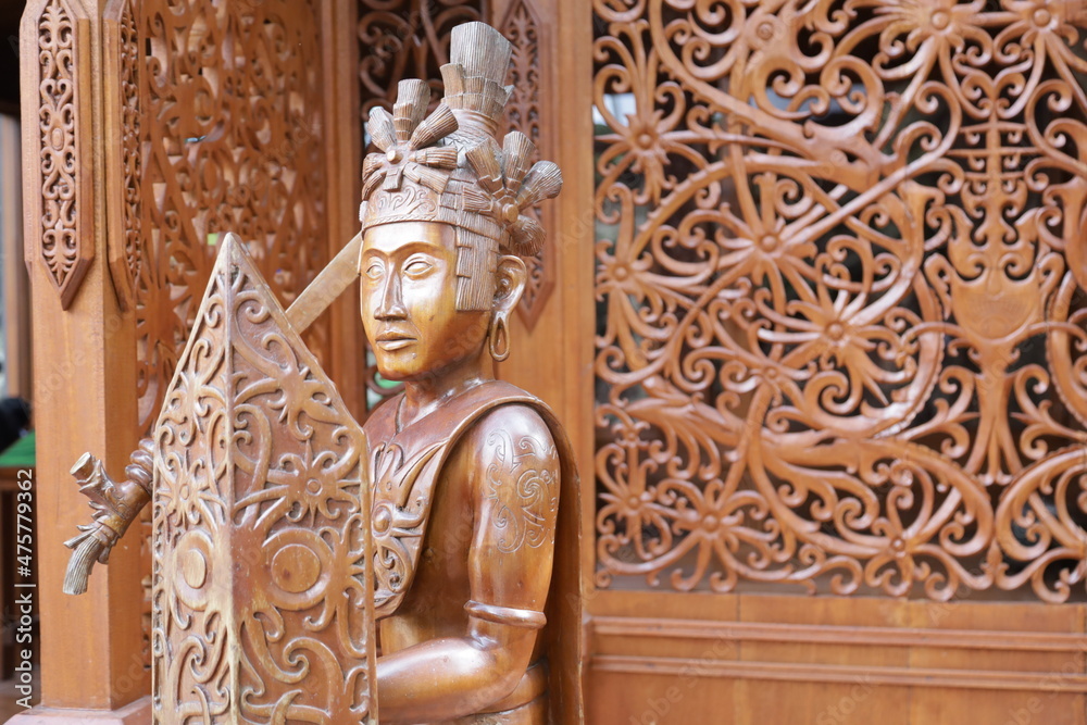 Indonesian Kalimantan Dayak tribe building, carved wood with ...