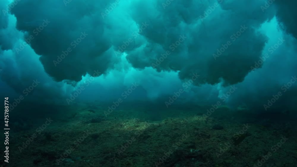 Video Stock Ocean wave forms underwater clouds. Crystal clear ocean ...