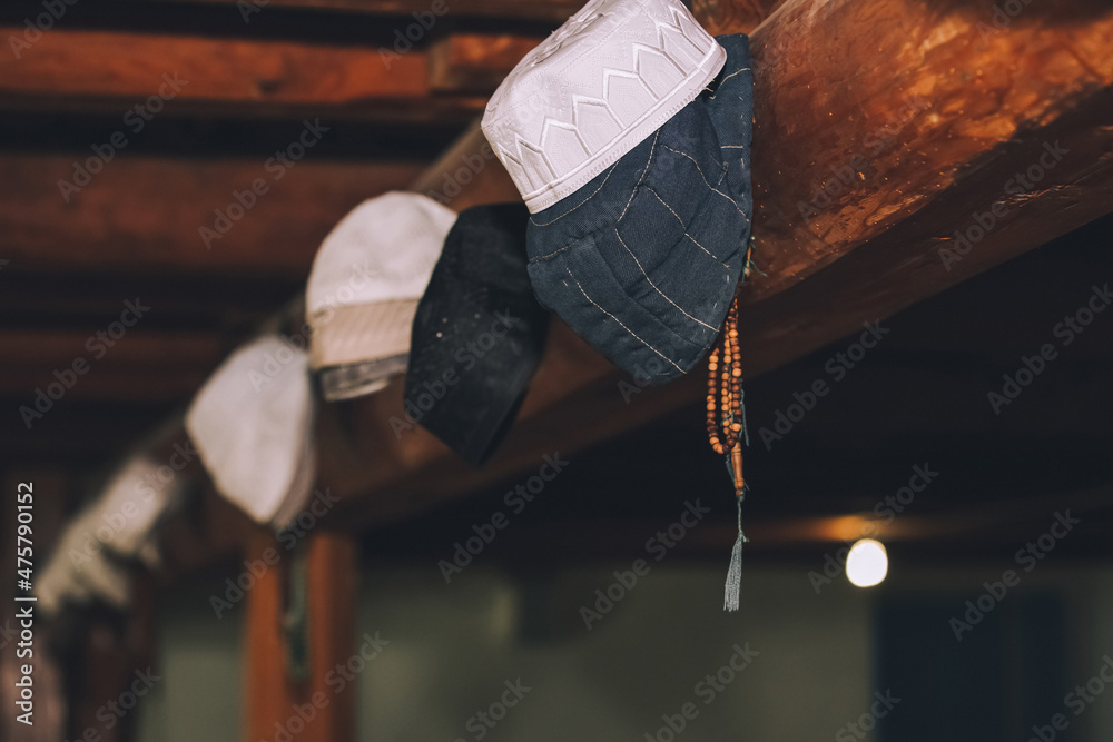 Inside an anThe traditional headdress of a Muslim in a mosque.cient ...