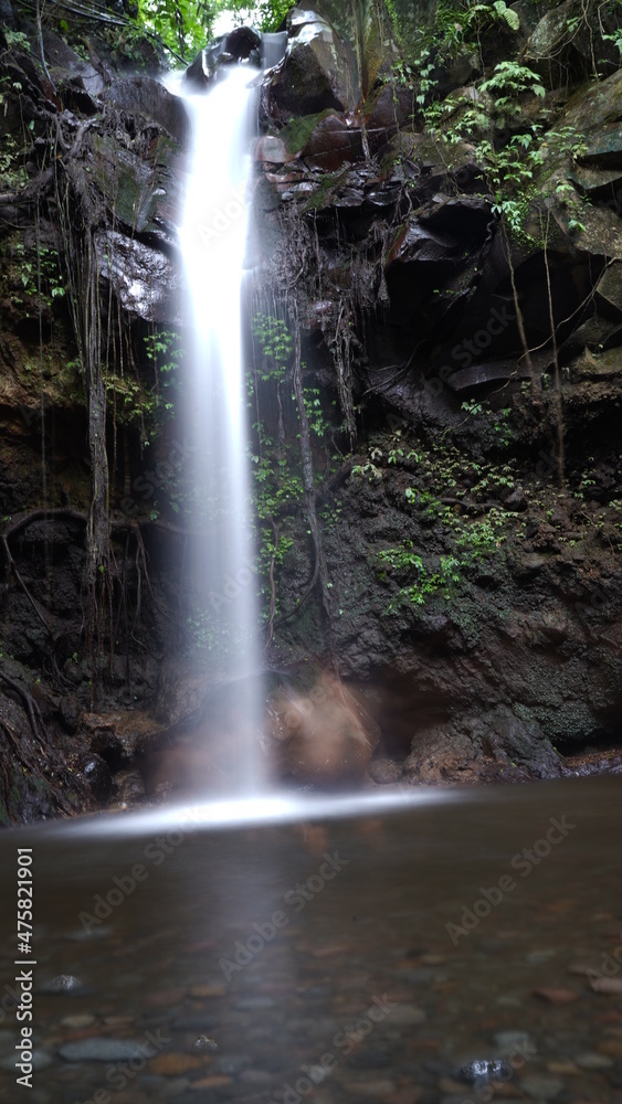 Curug Putri waterfall photographed with slow speed photography, flowing ...