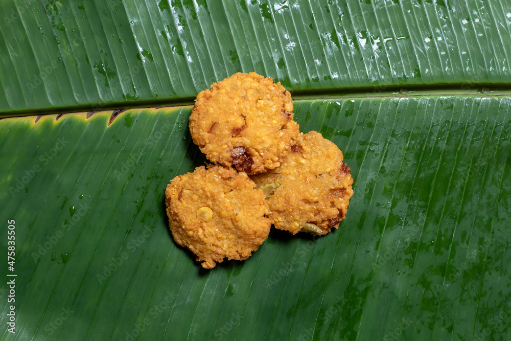 Masala Vada (Lentil Wada) is a popular South Indian snack at banana ...