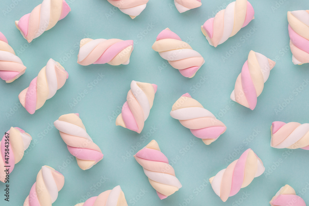 Colorful marshmallow laid out on pastel background. Creative textured ...