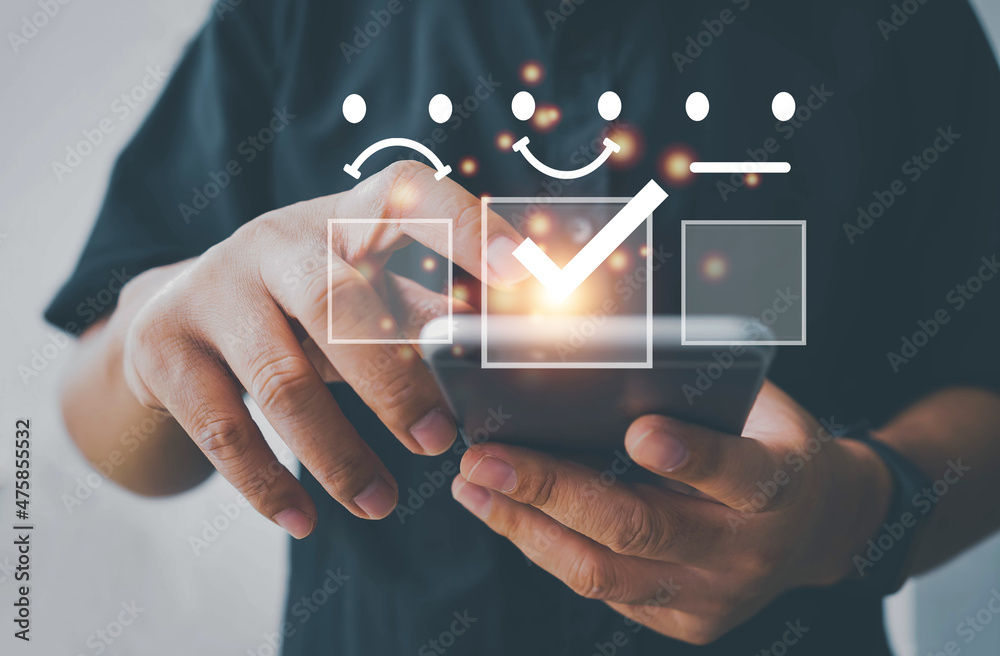 Foto de Customer service evaluation concept. Business people Is using a ...