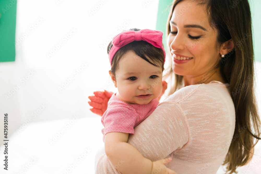 Adorable little baby girl burping Stock Photo | Adobe Stock