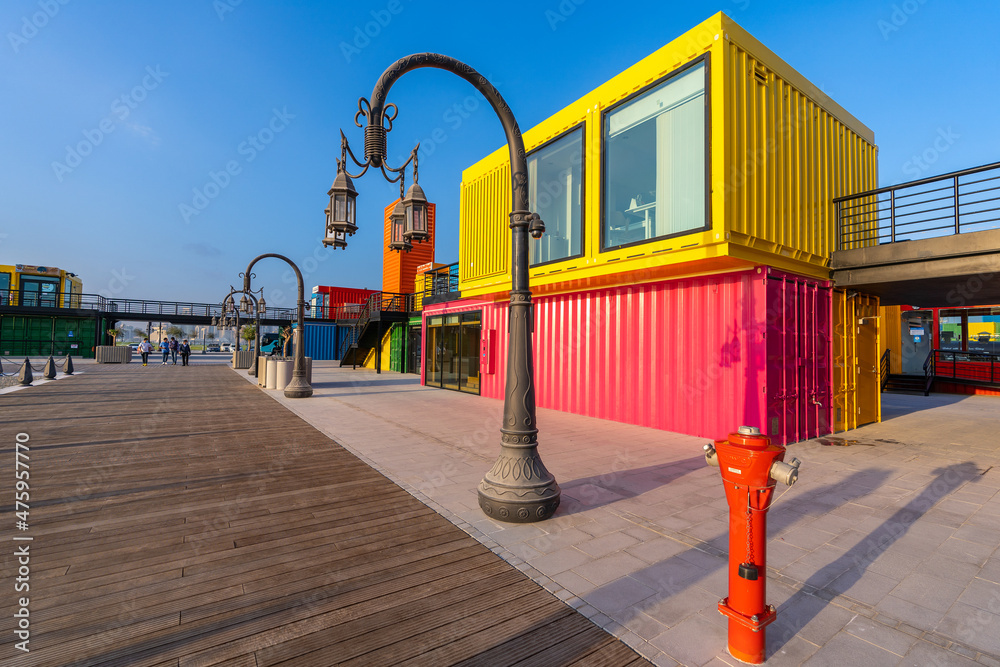 DOHA, QATAR - DEC 16, 2021: Box Park, located at the old Doha Port, is ...