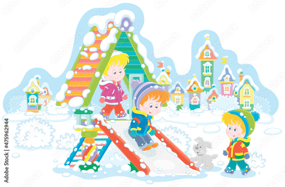 Merry little children playing on a colorful toy slide on a snow-covered ...