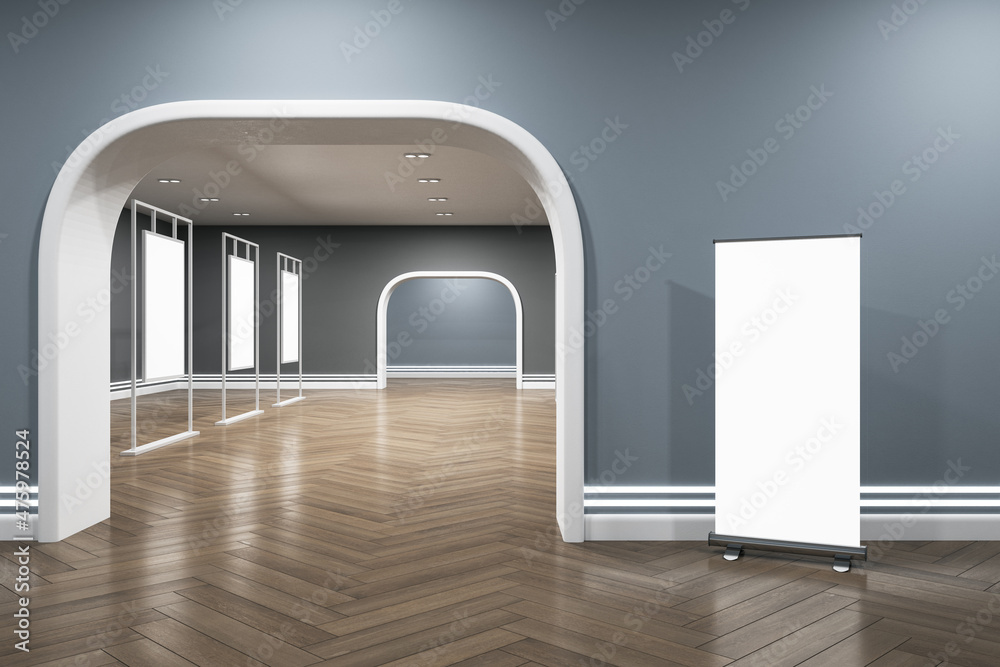 Modern exhibition hall interior with wooden flooring, arch entrance and ...