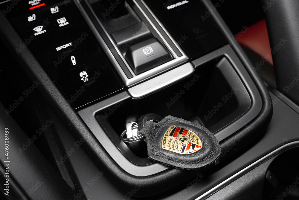 Porsche logo at the car keys on the panel Stock Photo | Adobe Stock