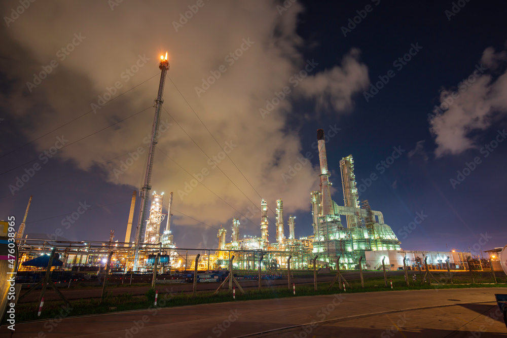 Oil refinery and tower flare fire of petrochemistry industry in oil and ...