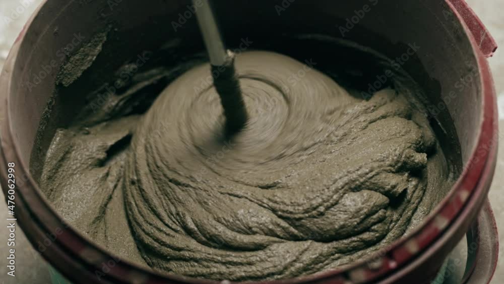 Mixing cement top view. Texture of cement mortar mixture close-up ...