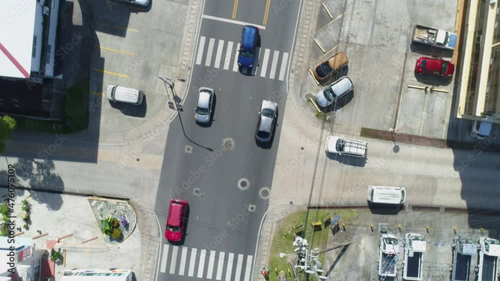 Vidéo Stock Rotating high angle satellite view of intersection and ...