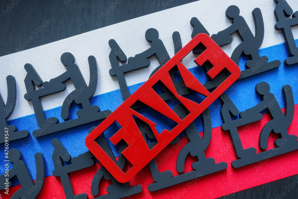 Word Fake, figures with computers on the Russian flag. Stock Photo ...