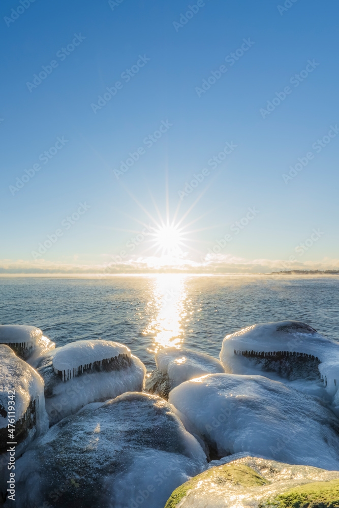 Sea smoke in a freezing cold day in Gulf of Finland. Early winter when ...