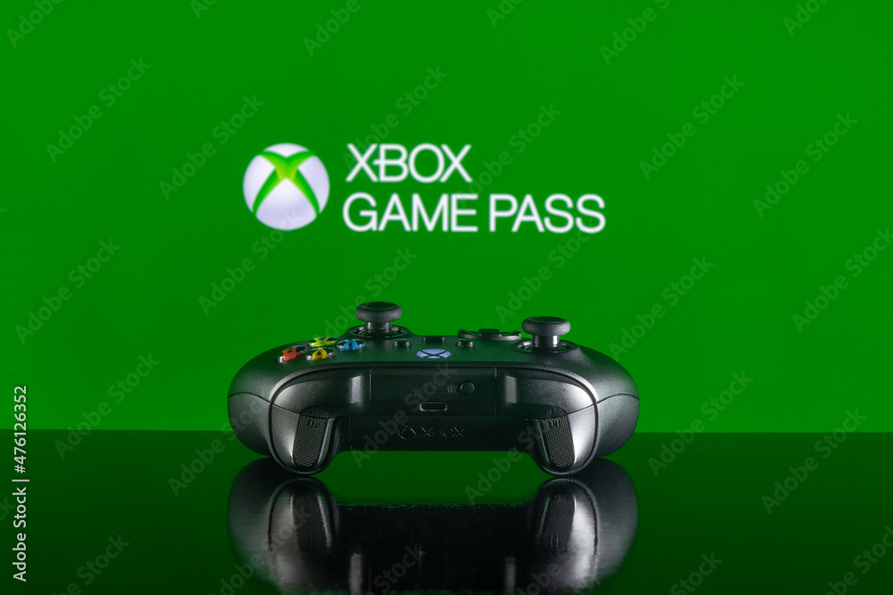 Xbox controller on focus with Xbox Game Pass logo at background, 20th ...