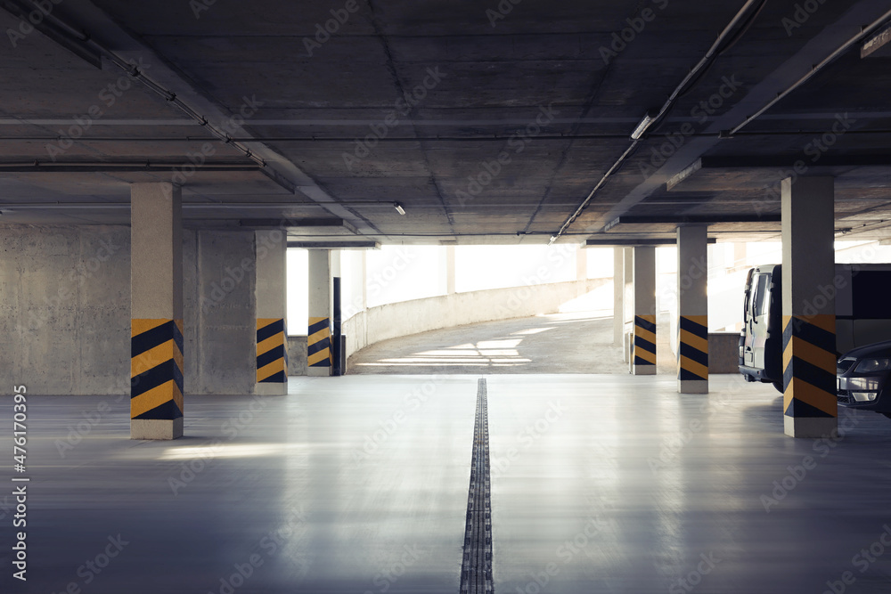 Open car parking garage with ramp on sunny day Stock Photo | Adobe Stock