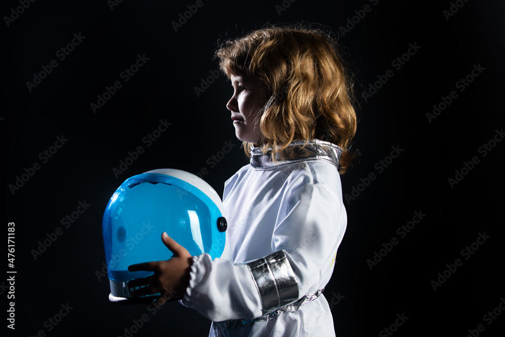 Little boy wearing an astronaut helmet costume and. Cute kid in ...