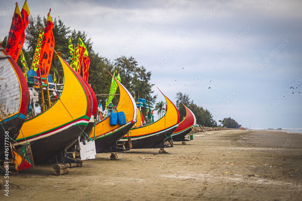 Fishing Boats docked on the beach in Cox's Bazar, Bangladesh Stock ...