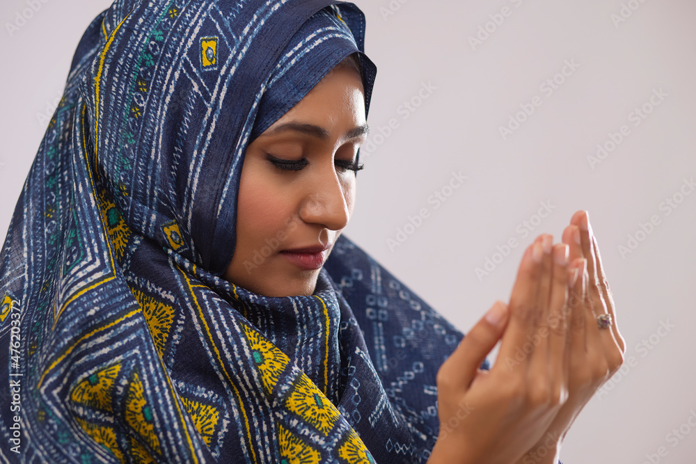Portrait of Muslim woman praying Stock Photo | Adobe Stock