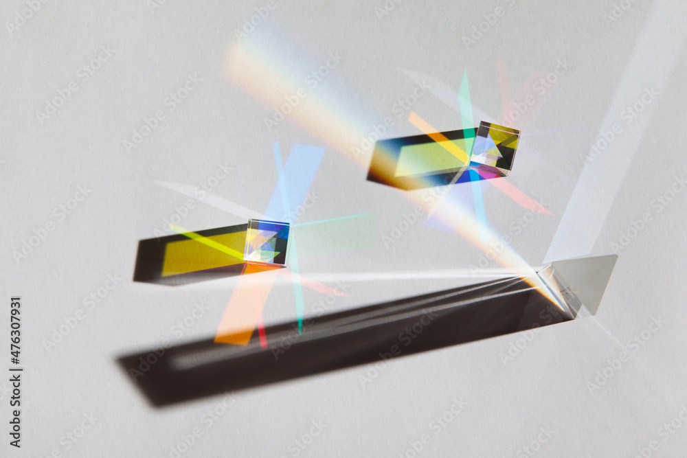 Glass geometric figures prisms with light diffraction of spectrum ...