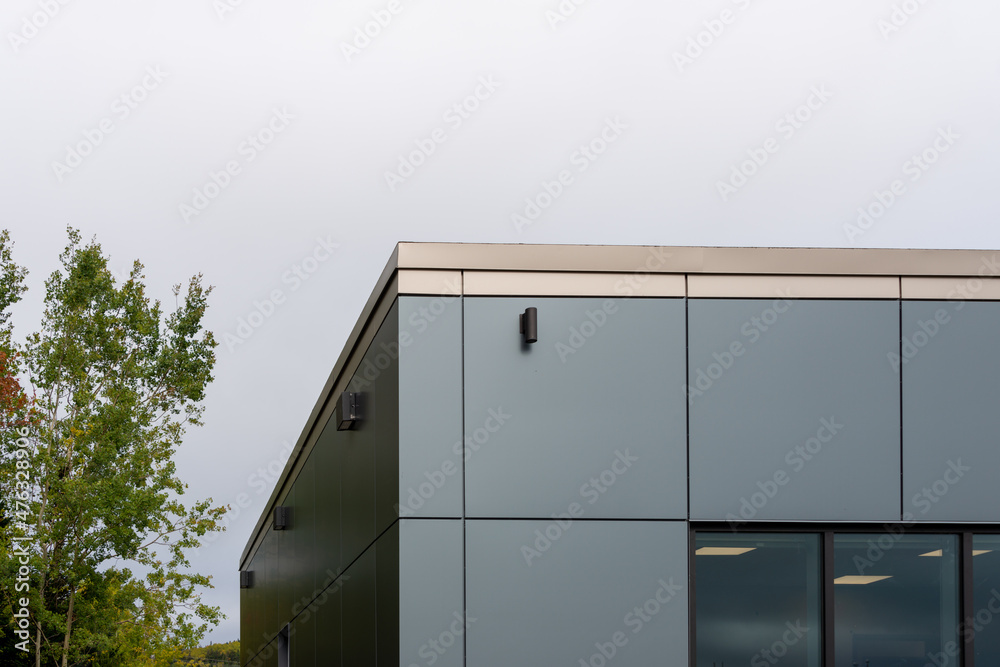 The exterior wall of a contemporary commercial style building with ...