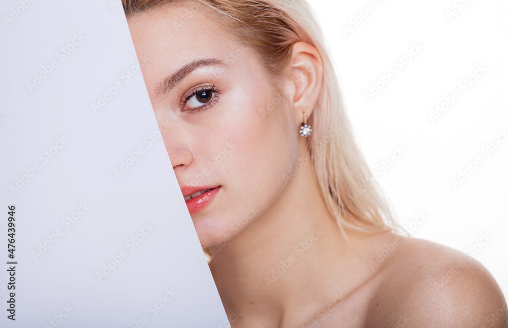 From a blank sheet of paper concept. Young woman holding white paper ...