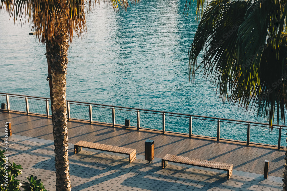 bluewater beach corniche view with a bench Stock Photo | Adobe Stock