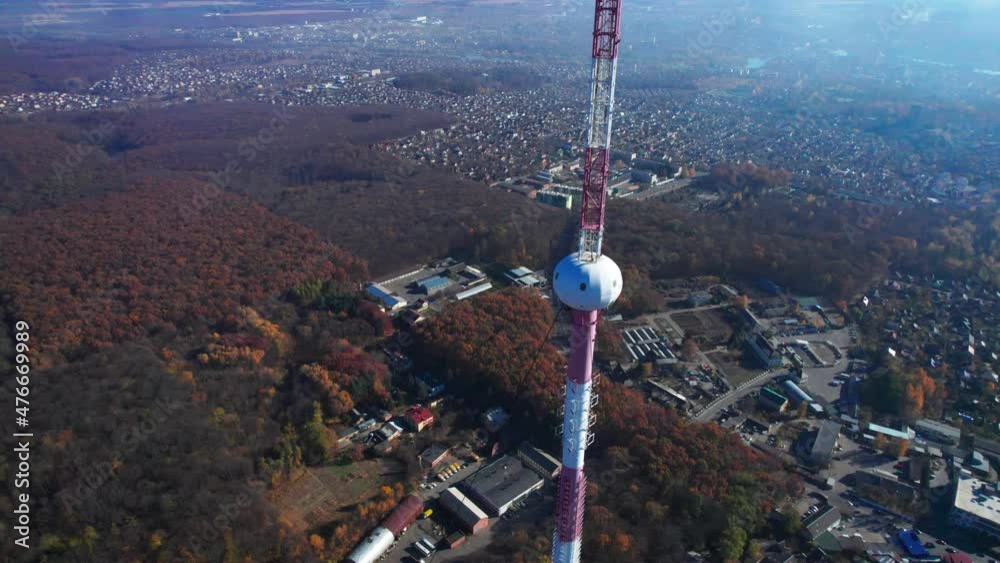Closeup aerial view around of the telecommunication tower. Telecom tower antennas and satellite ...