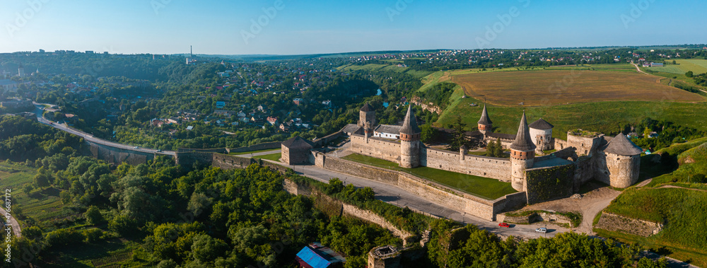 Aerial view of the romantic stone medievel castle on top of the ...