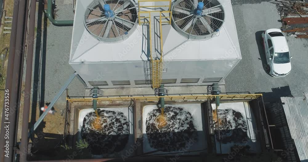 Cooling tower from a drone. Industrial cooling towers. Wet cooling ...