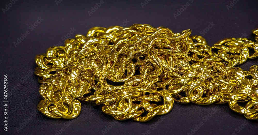 Gold chain to be worn around the neck. A chain is a sequential assembly ...