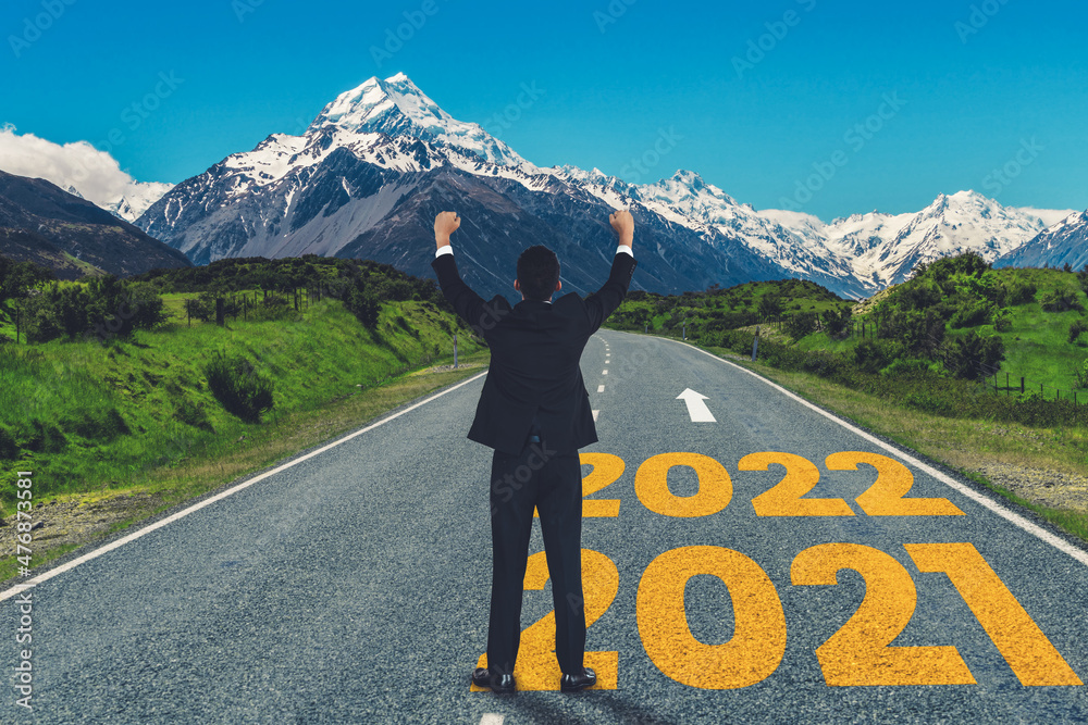 The 2022 New Year journey and future vision concept . Businessman ...