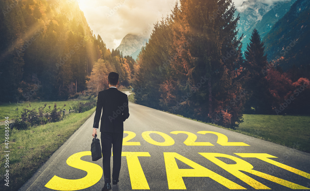 The 2022 New Year journey and future vision concept . Businessman ...