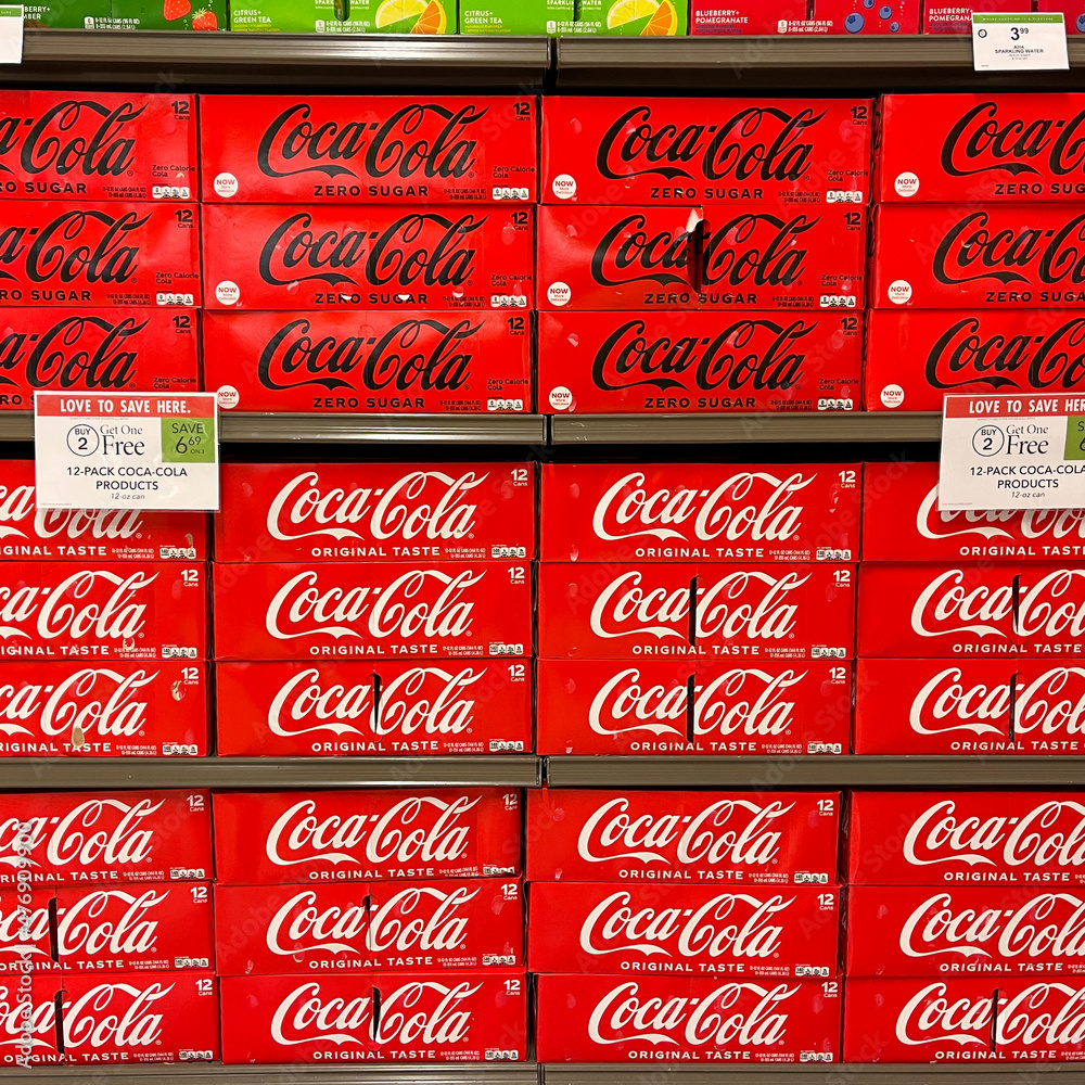 A display of Coca Cola Original and Zero Sugar Coca Cola cases at a ...