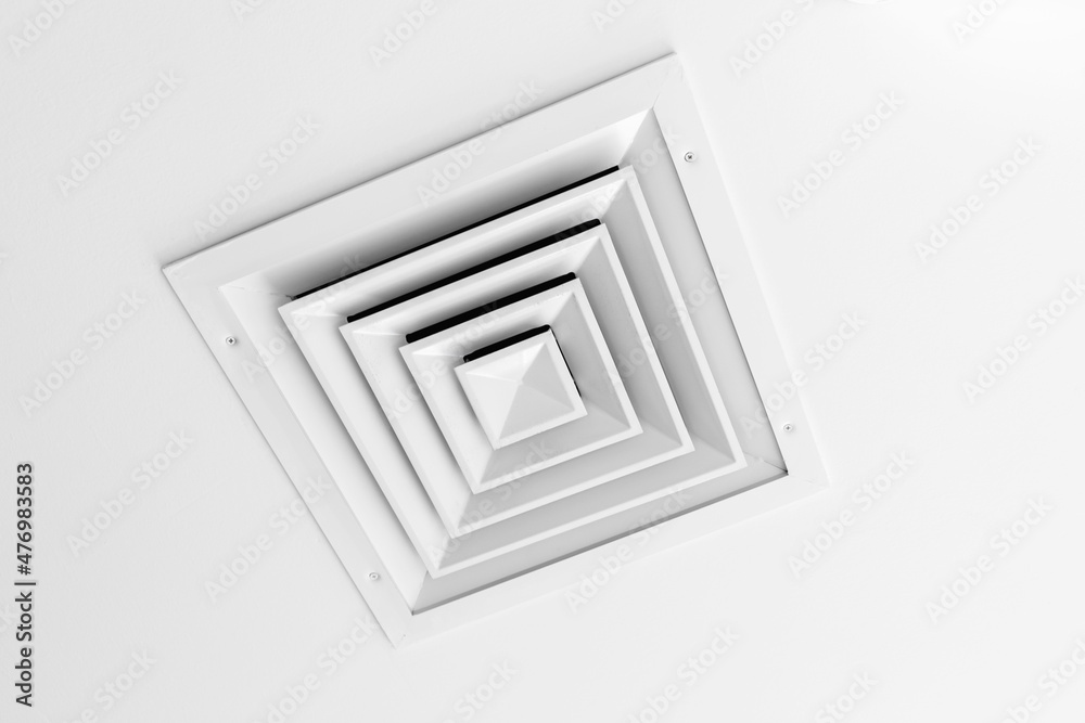 White ceiling ventilation grille with square diffusors, Stock Photo ...